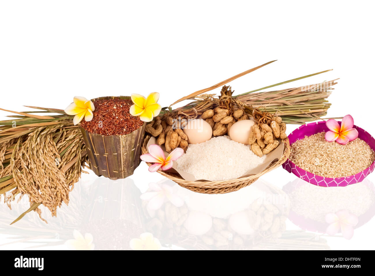 Red rice, Paddys, Flowers, Eggs, Peanut on white background Stock Photo ...