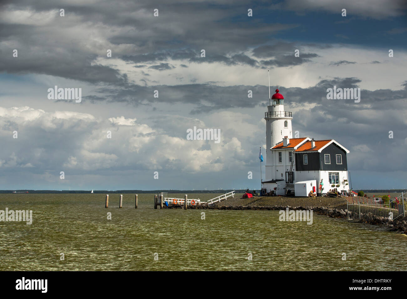 Netherlands, Marken, Lighthouse called Het Paard near lake called ...