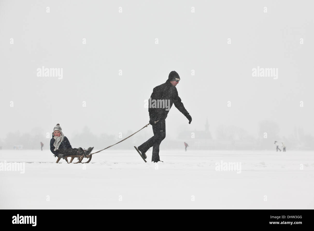 Boy pulling sledge hi-res stock photography and images - Alamy