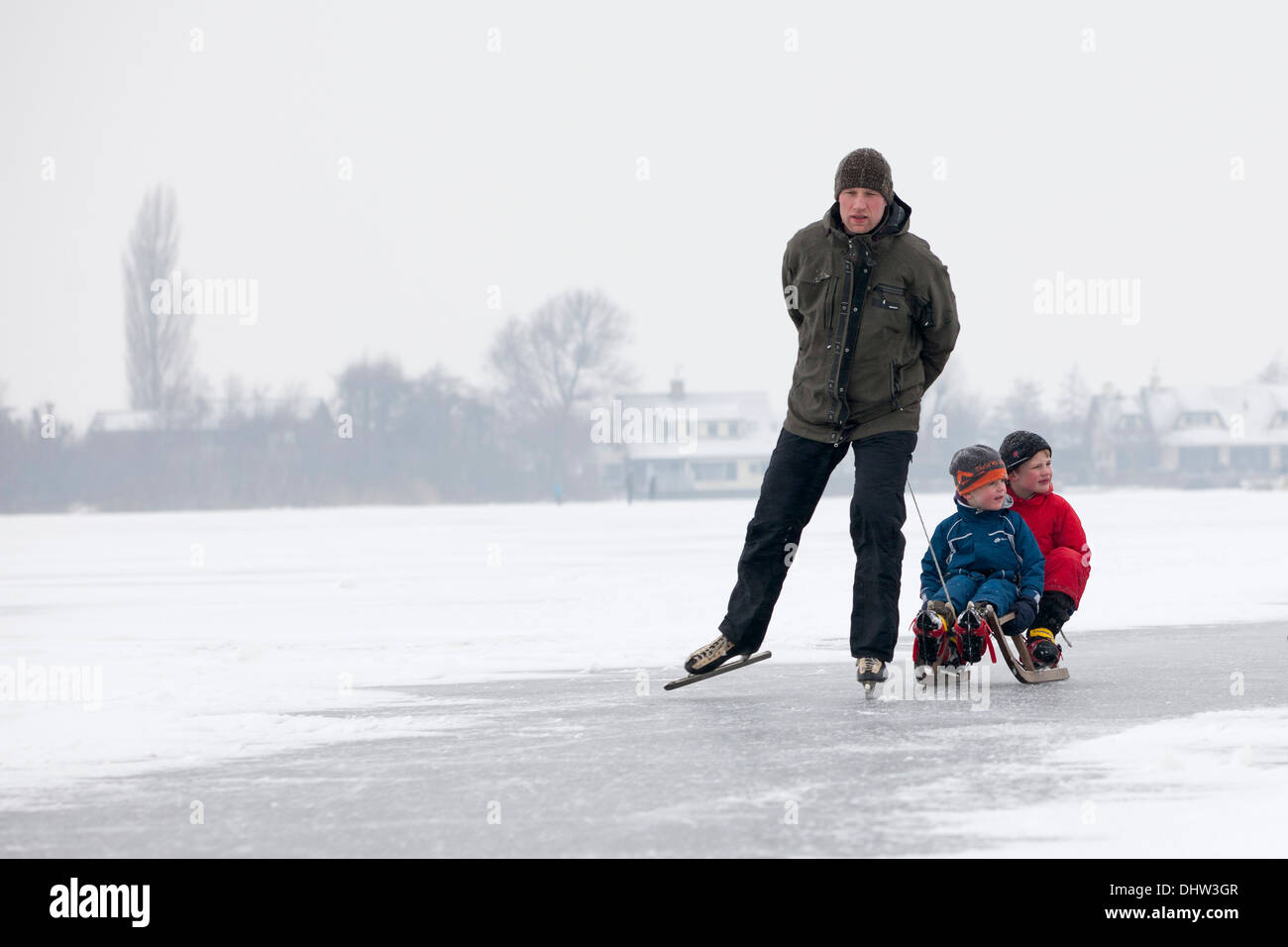 Boy pulling sledge hi-res stock photography and images - Alamy