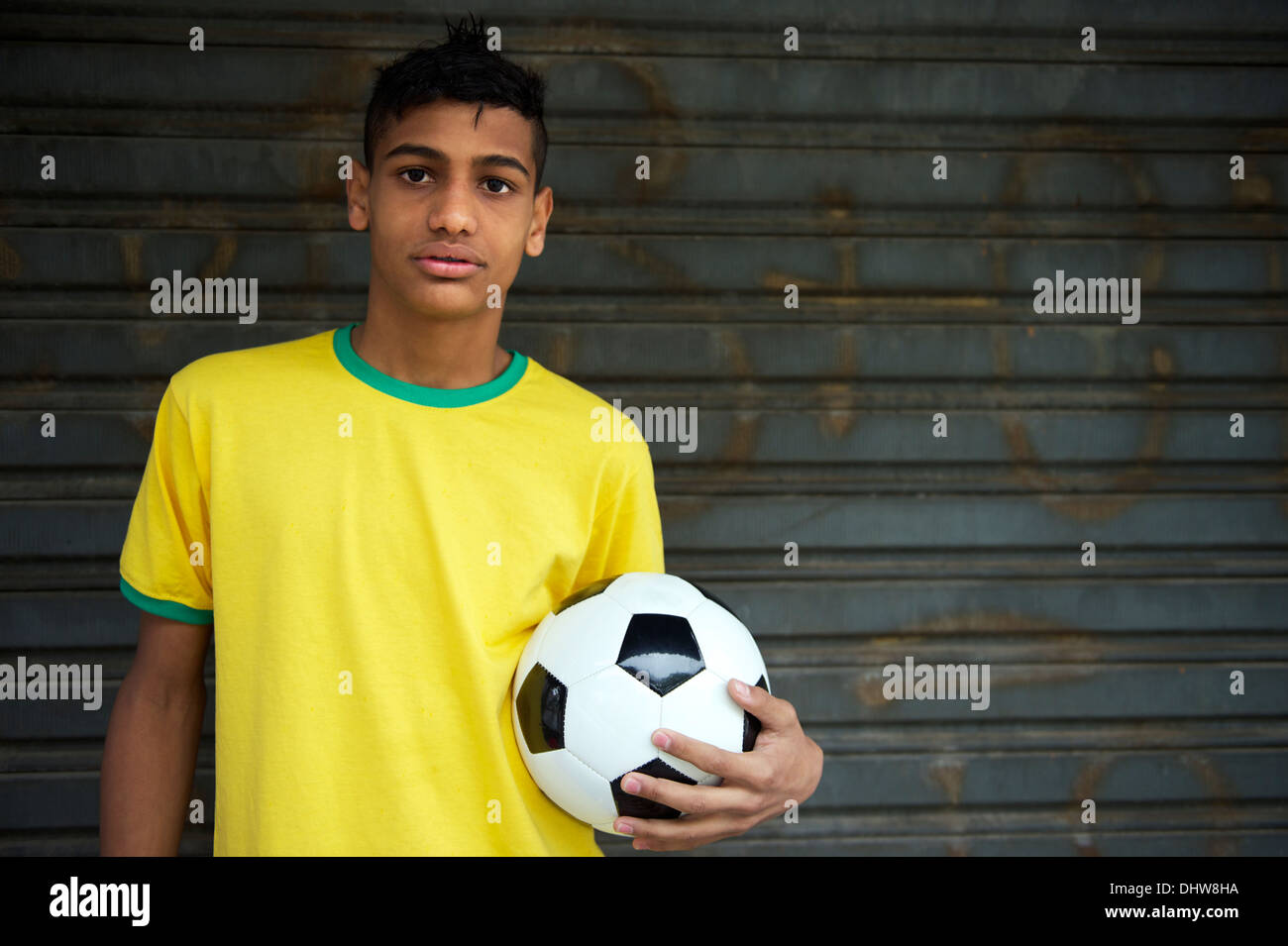 Football player posing soccer ball hi-res stock photography and images ...