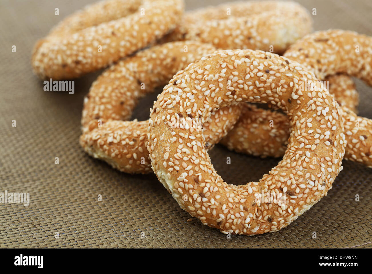 Round rusks with sesame seeds, closeup picture Stock Photo - Alamy