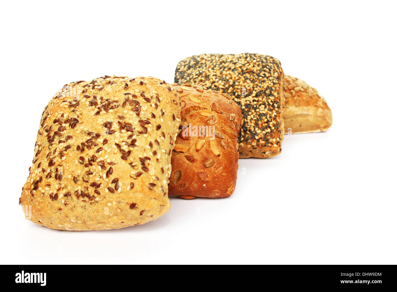 Breads with different seeds isolated on white background Stock Photo ...