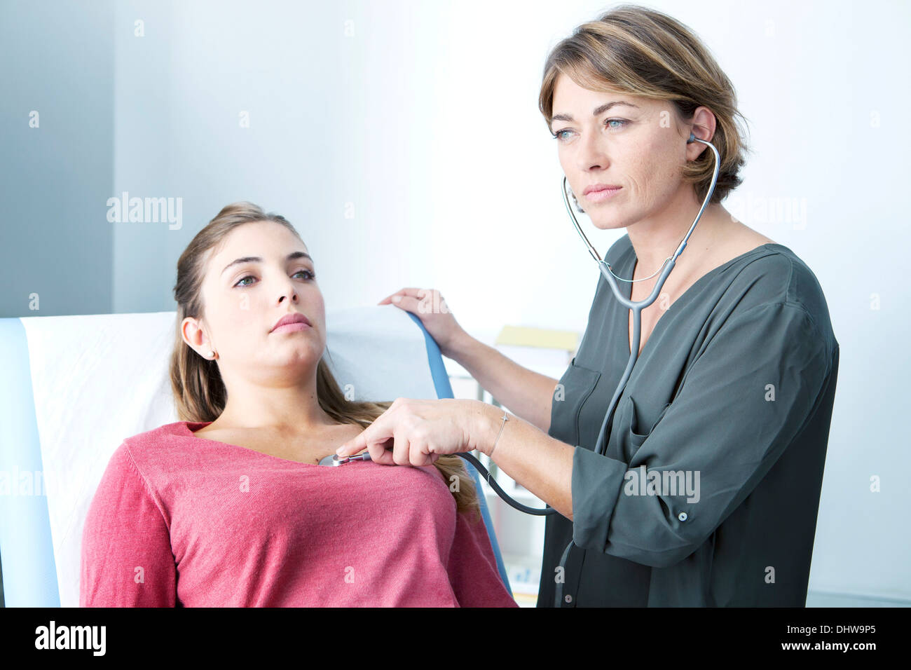 Auscultation woman cardiac hi-res stock photography and images - Alamy
