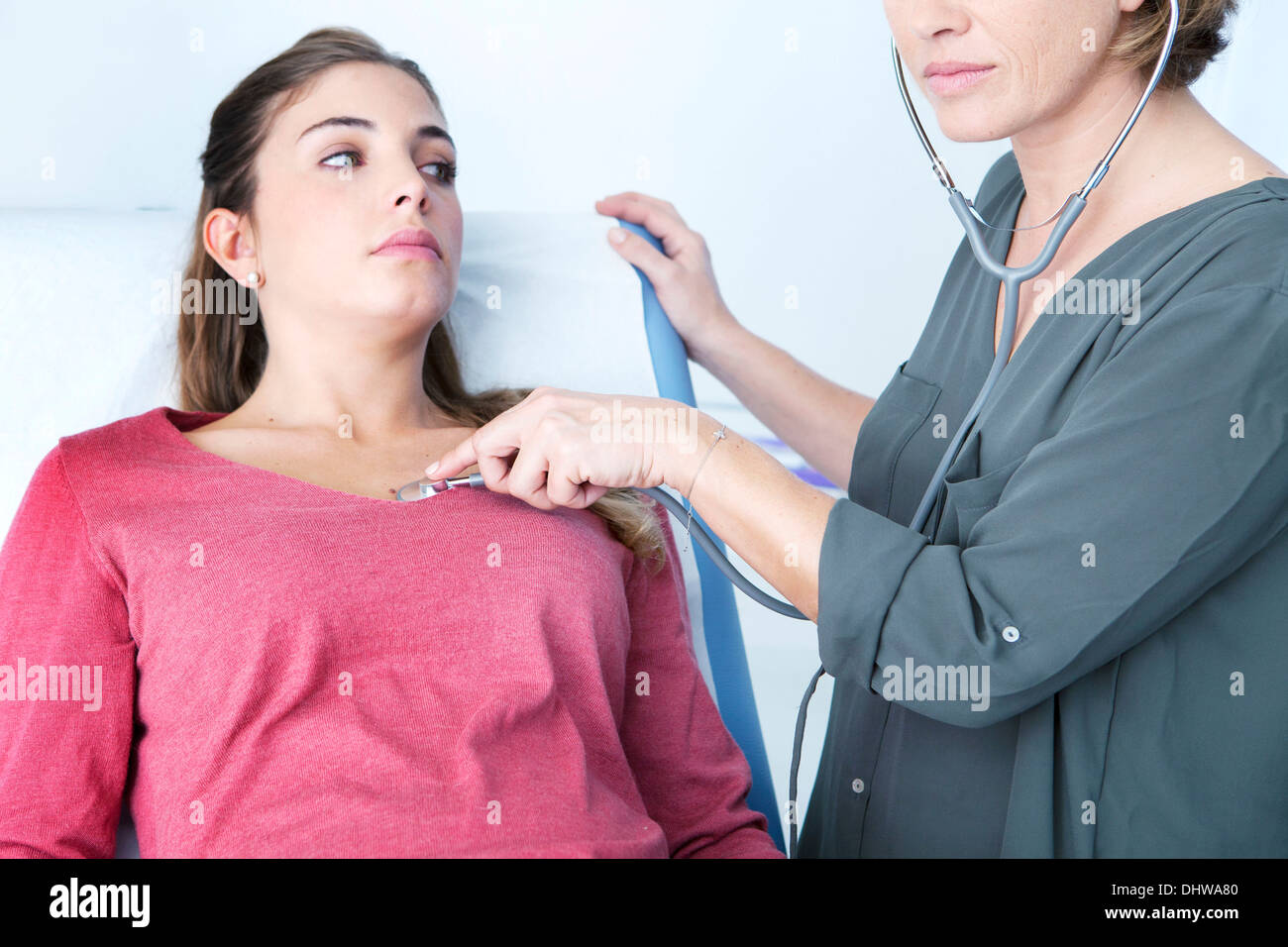 Female physical exam auscultation hi-res stock photography and images ...