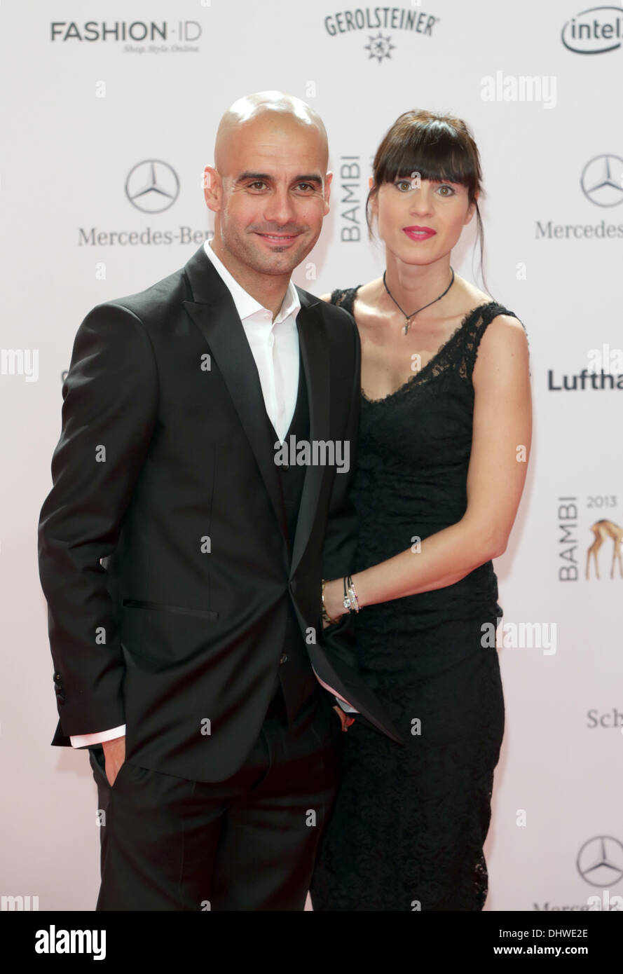 Berlin, Germany. 14th Nov, 2013. Pep Guardiola and his wife Cristina ...