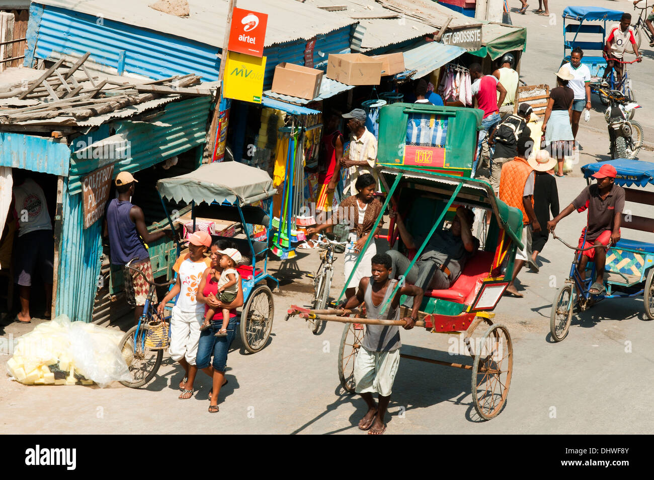 street scene with pousse-pousse, tulear, madagascar Stock Photo - Alamy