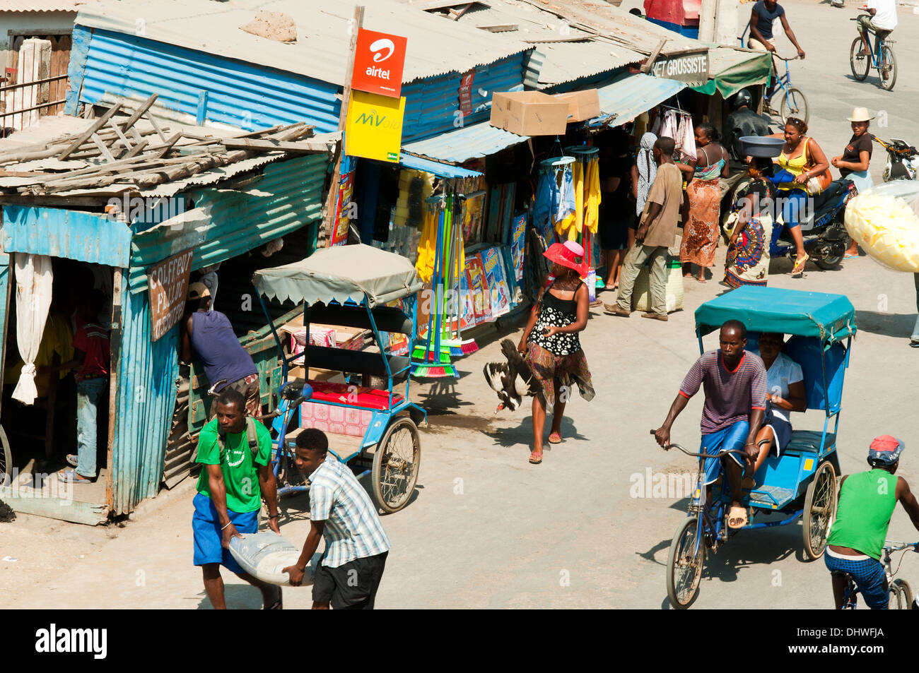 street scene with pousse-pousse, tulear, madagascar Stock Photo - Alamy
