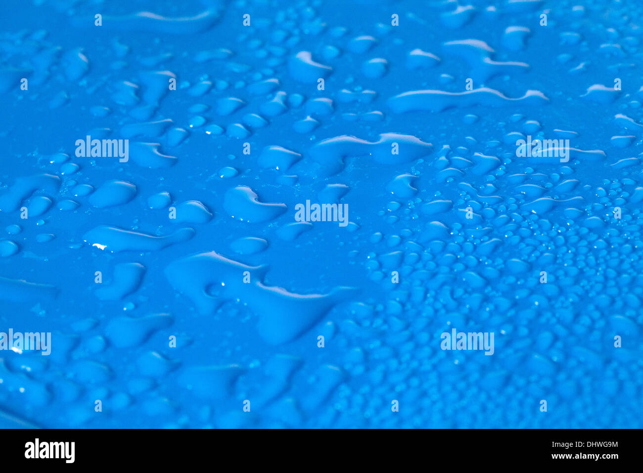 Water Droplets on Blue Plastic Surface Stock Photo - Alamy