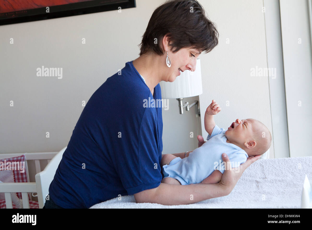 Changing baby boy hi-res stock photography and images - Alamy