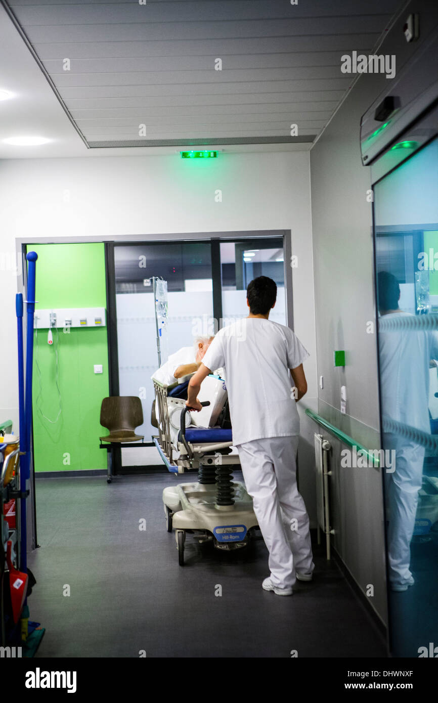 Back view patient man hospital bed hi-res stock photography and images ...