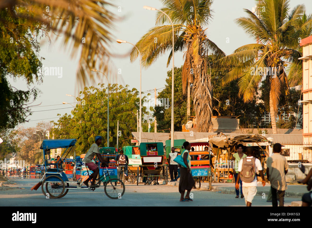 street scene with pousse-pousse, tulear, madagascar Stock Photo - Alamy