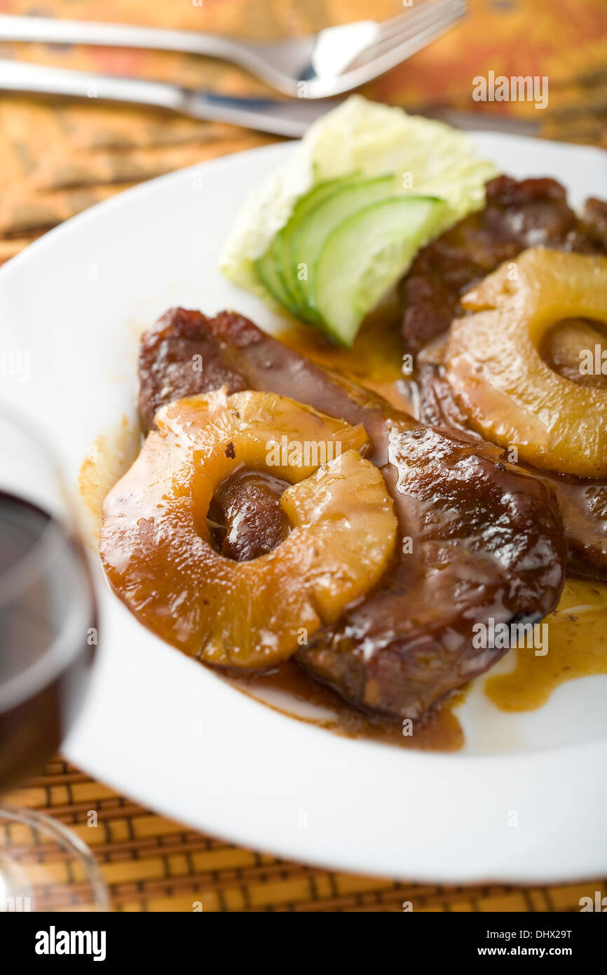 Roast meat with pineapple slices Stock Photo - Alamy