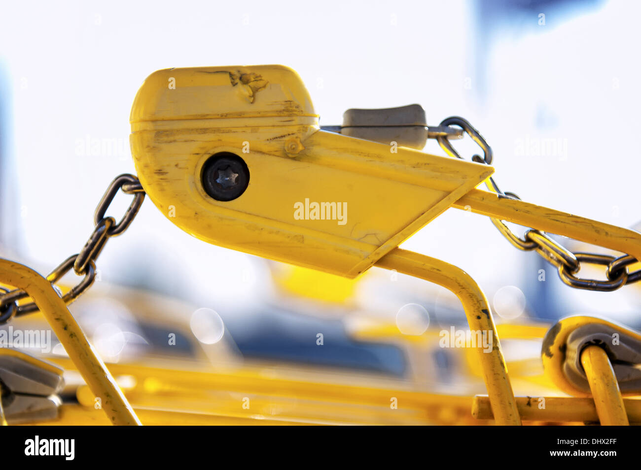 Key lock a yellow shopping cart Stock Photo - Alamy