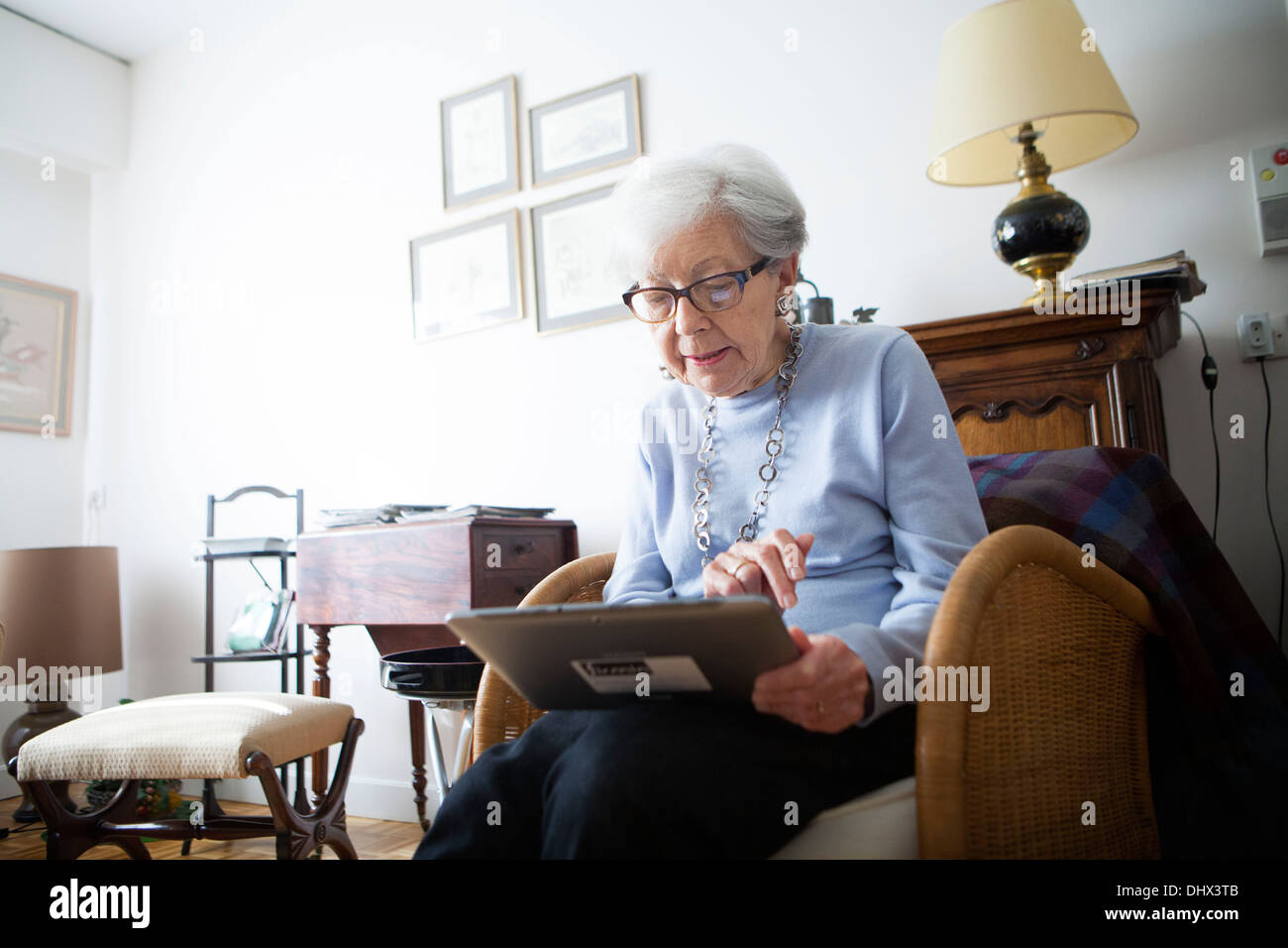 ELDERLY PERSON WITH TABLET Stock Photo - Alamy