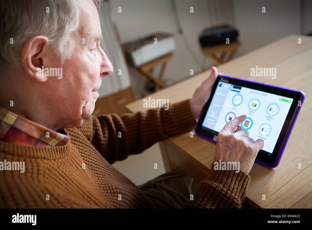 ELDERLY PERSON WITH TABLET Stock Photo - Alamy