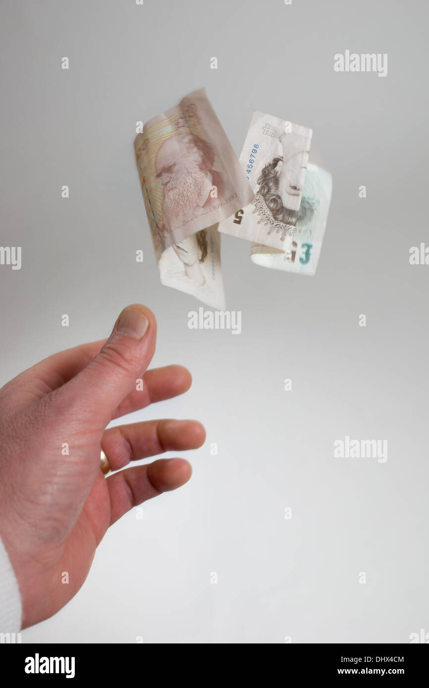 giving money in the hand Stock Photo - Alamy