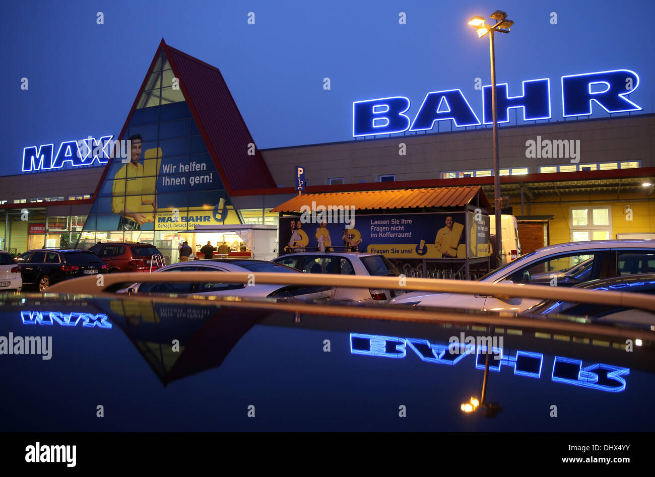 Rostock, Germany. 15th Nov, 2013. The neon signs of the hardware store ...