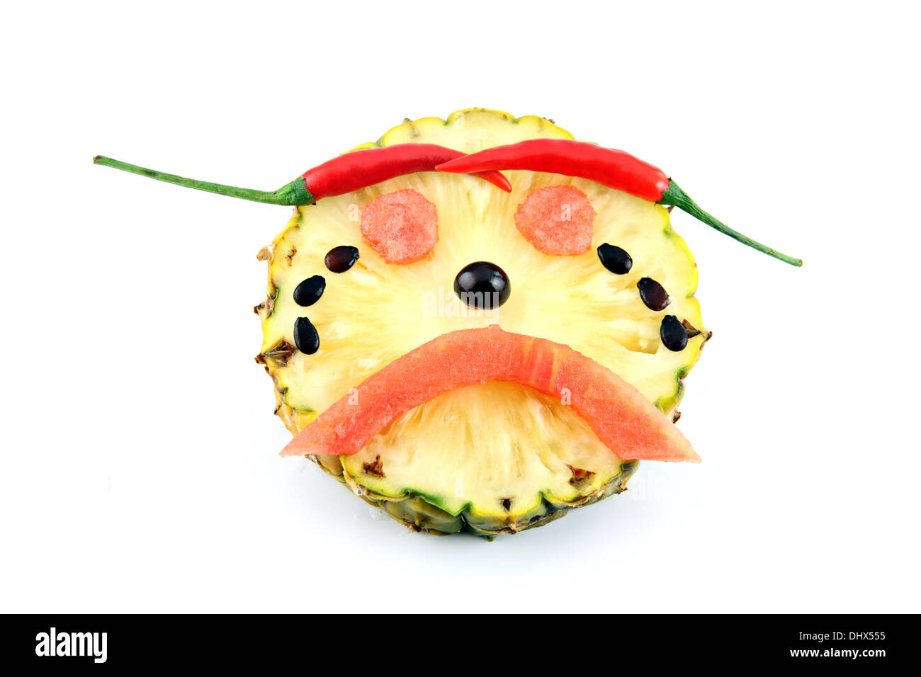 Sadly Face of Emotion image made from mix fruits on white background ...
