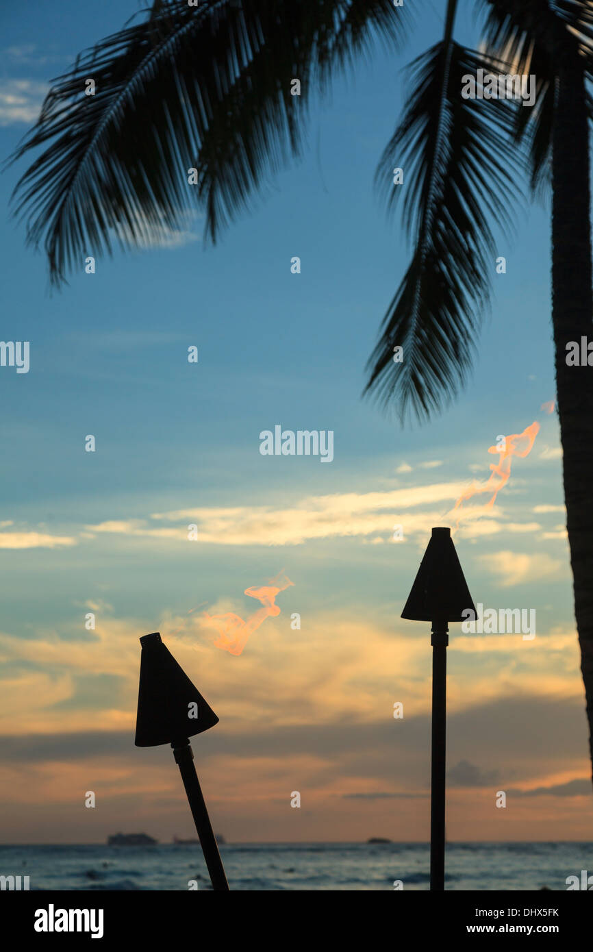 USA, Hawaii, Oahu, Honolulu, Waikiki Beach, Tiki Torches Stock Photo ...