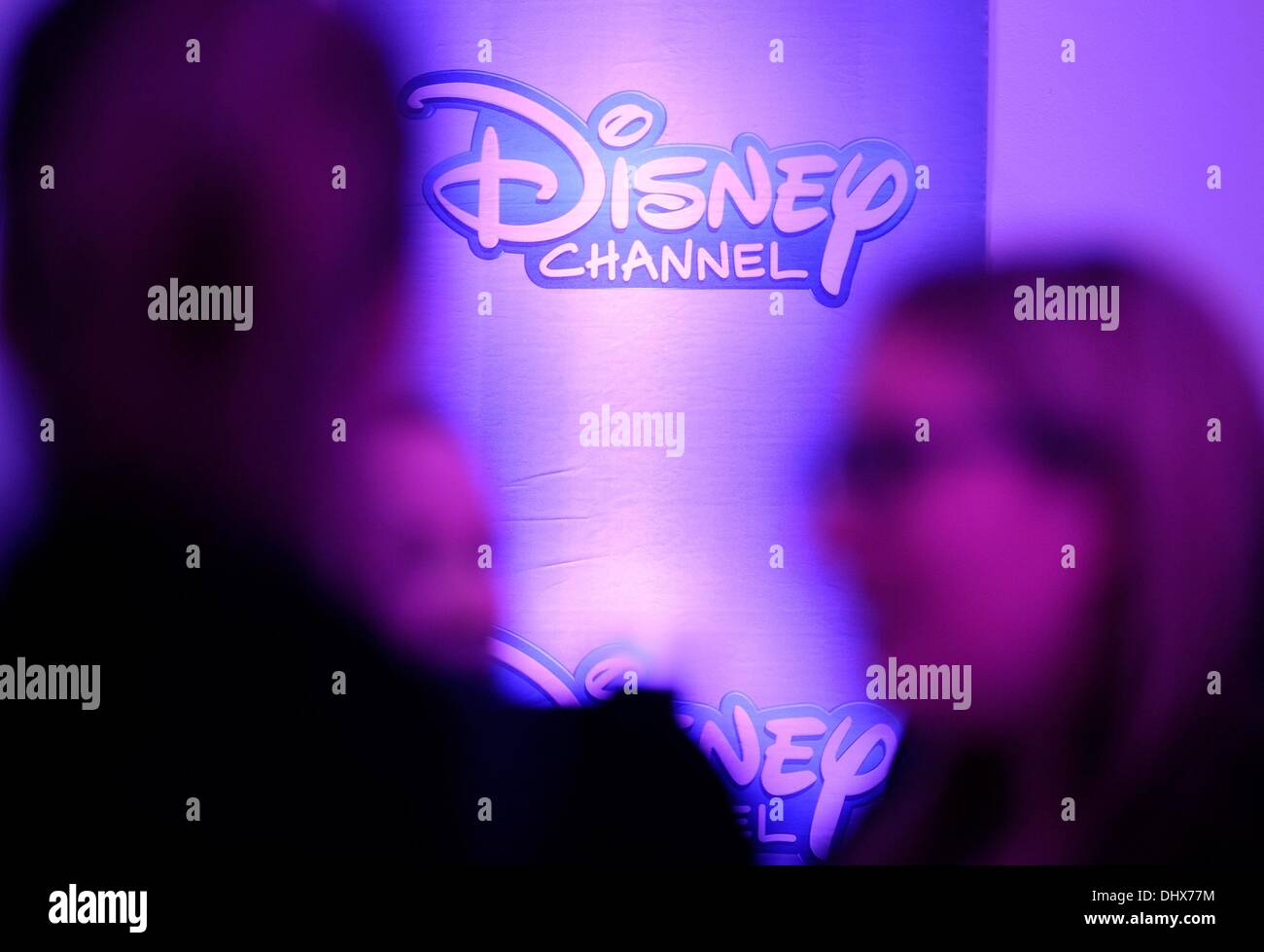 Hamburg, Germany. 14th Nov, 2013. Guests stand in front of the Disney ...