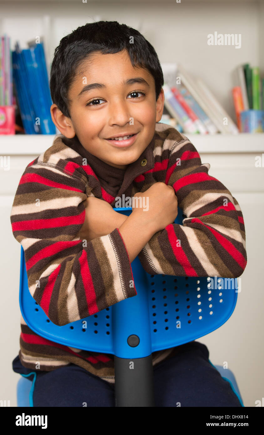 Boy class smiling desk hi-res stock photography and images - Alamy