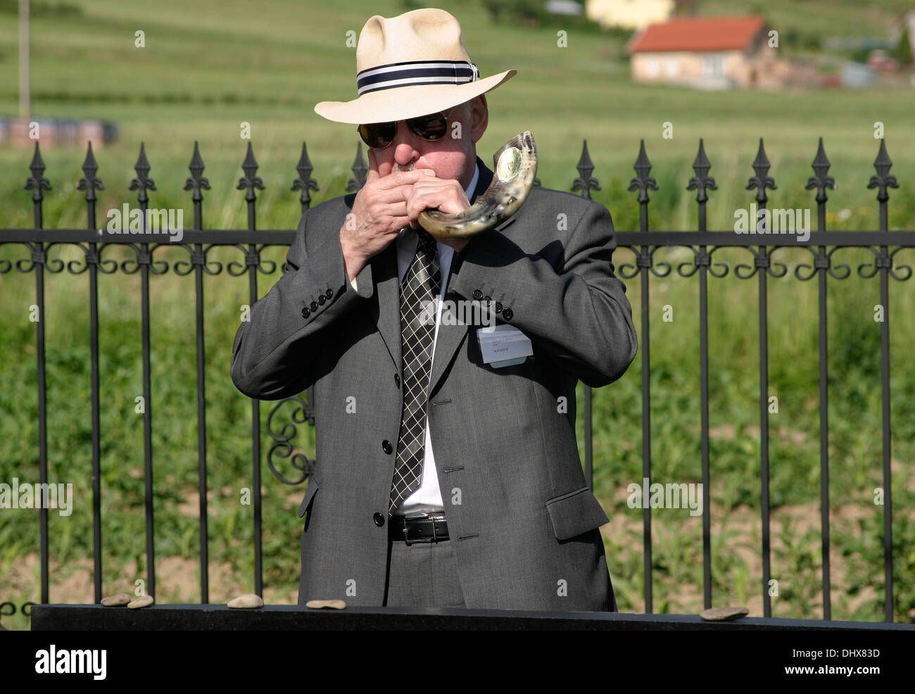 Joe Lehrer blowing the shofar, the ram’s horn at re-consecration of ...
