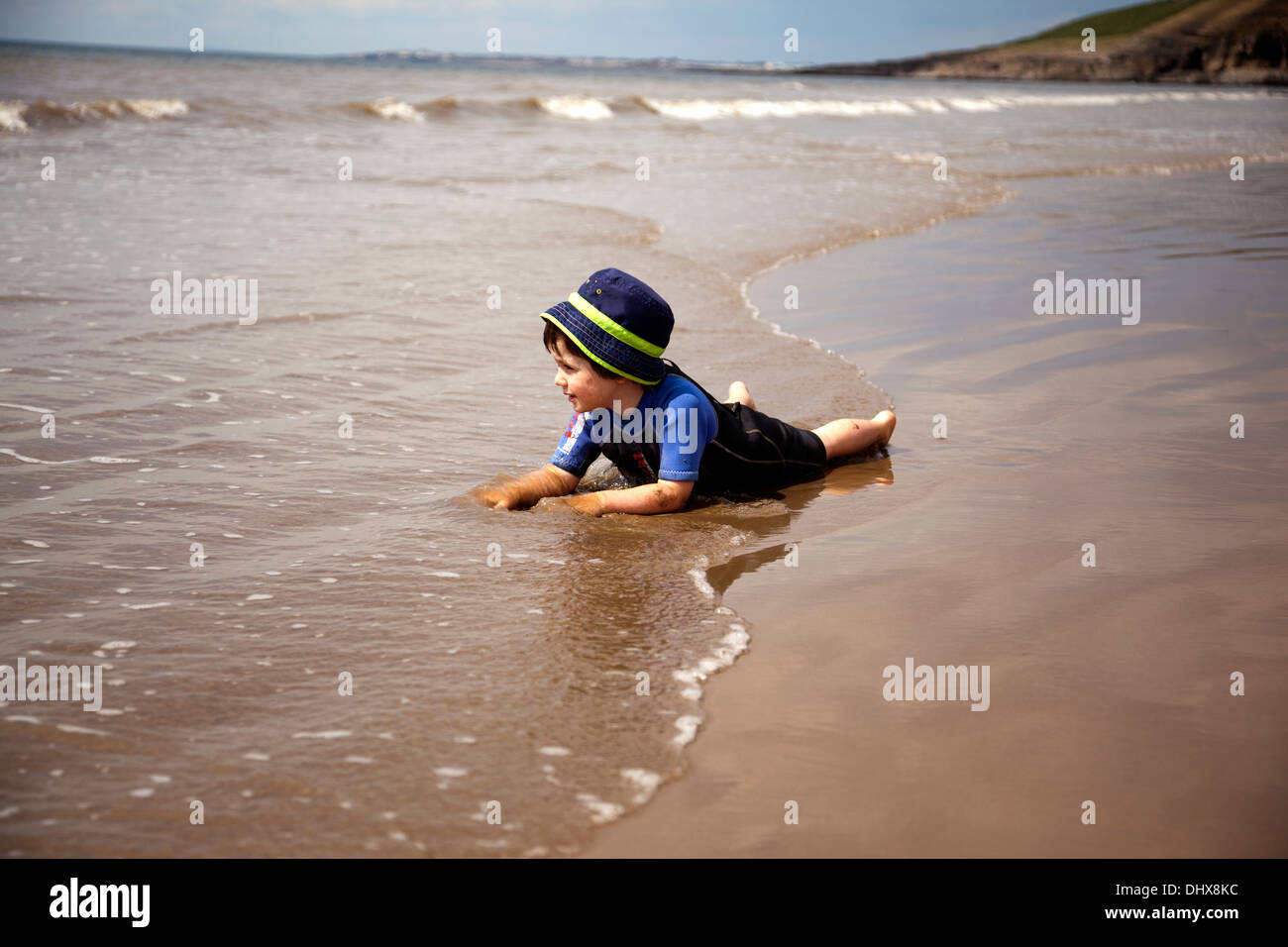 boy at seaside, beech Stock Photo - Alamy