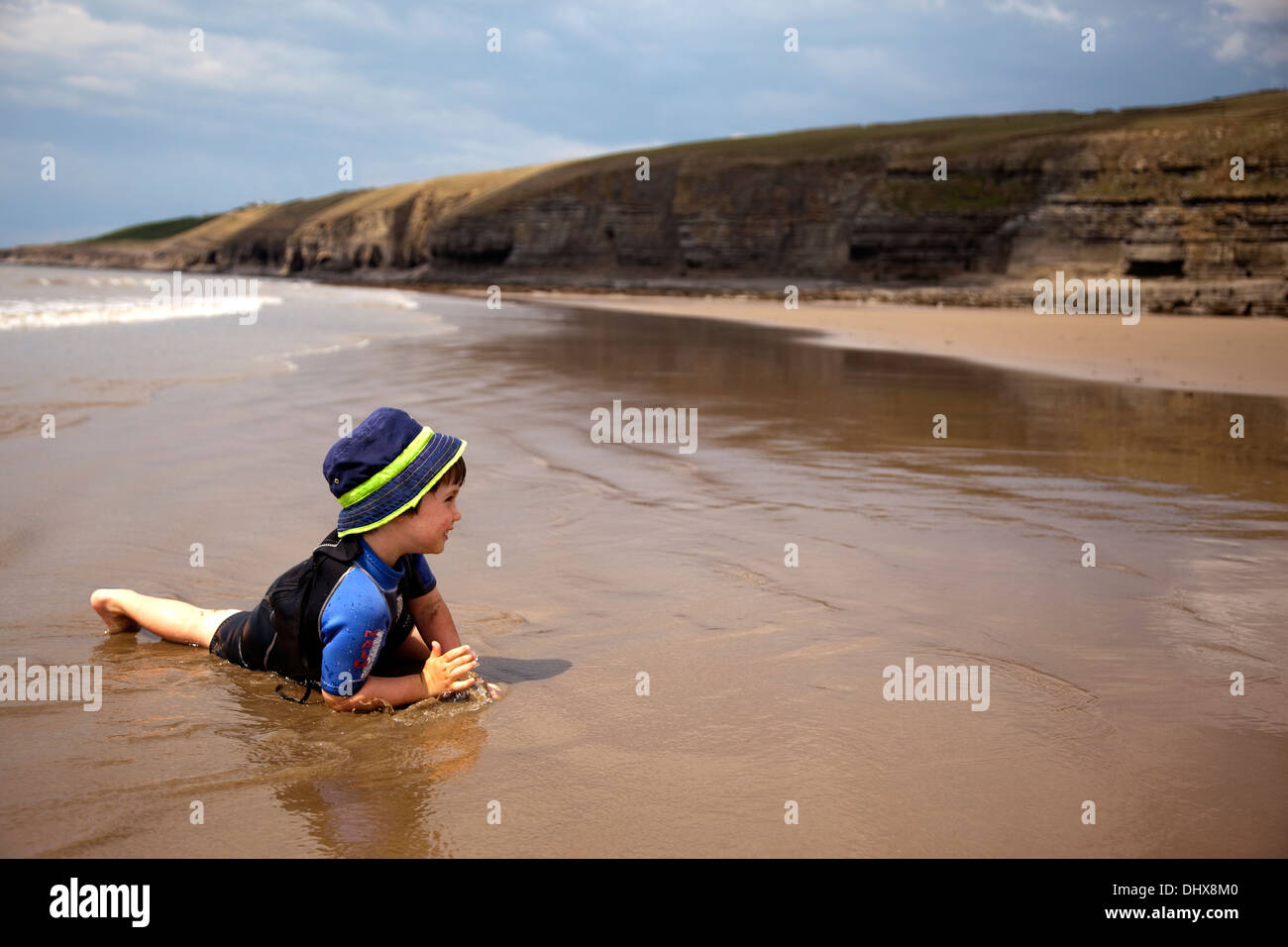 boy at seaside, beech Stock Photo - Alamy