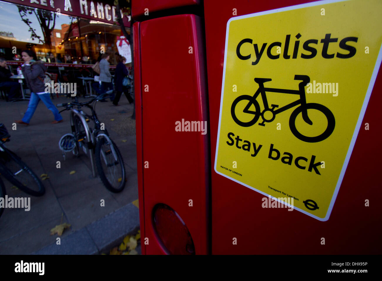 London UK. November 15th 2013. A sign on the back of a bus warning ...