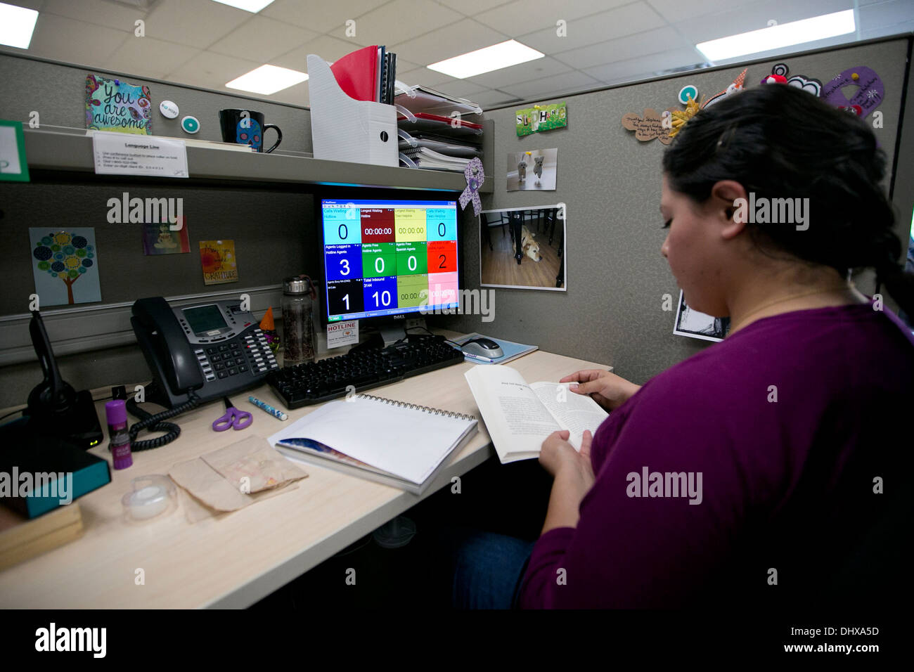Advocate employee at the domestic abuse hotline center takes phone ...