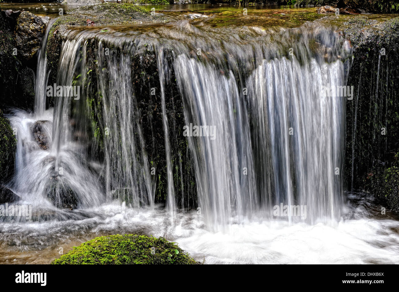 Water everywhere small waterfall Stock Photo - Alamy