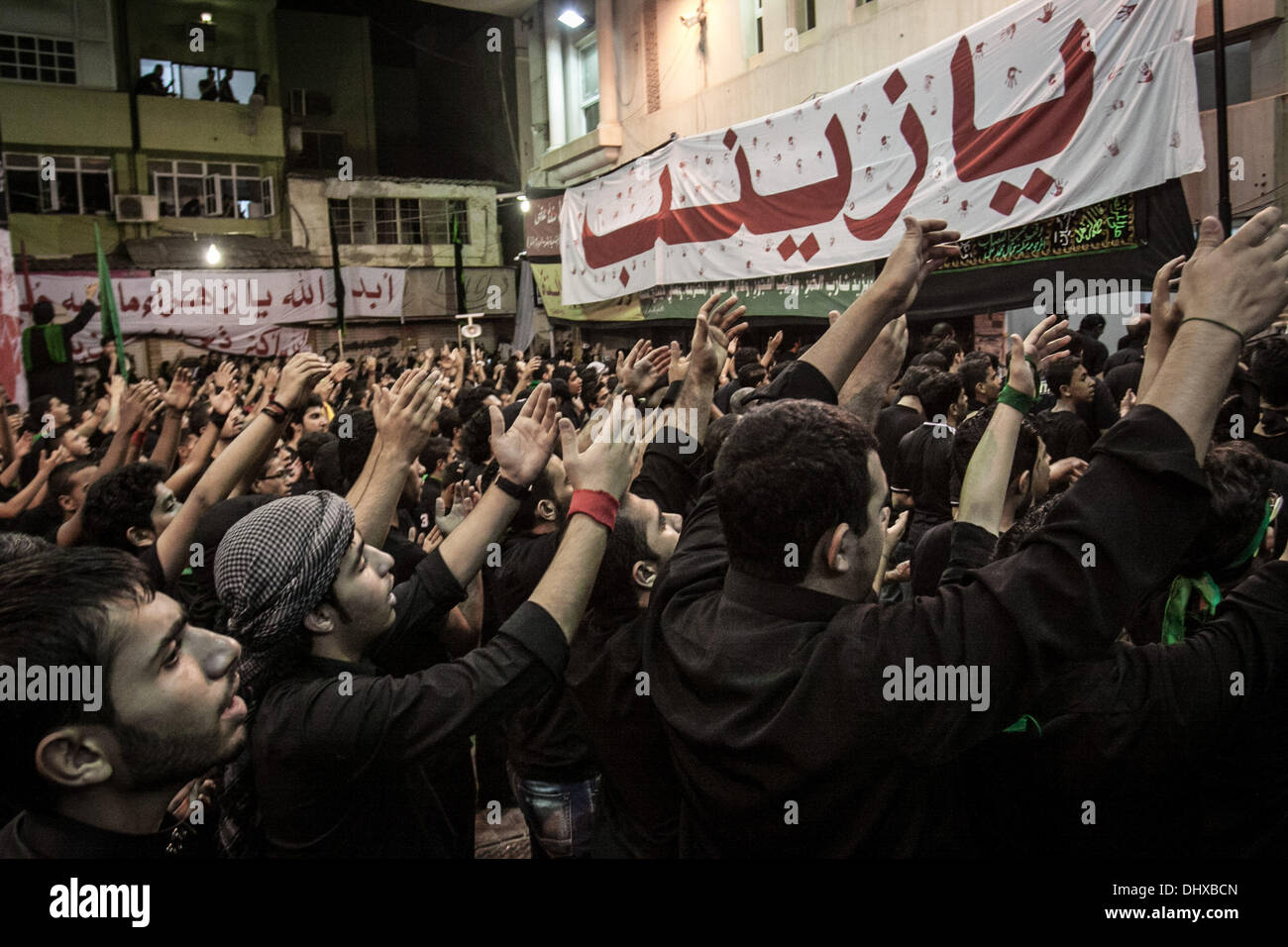 Manama, Bahrain. 14th Nov, 2013. Ritual of Muharram morning in Manama ...