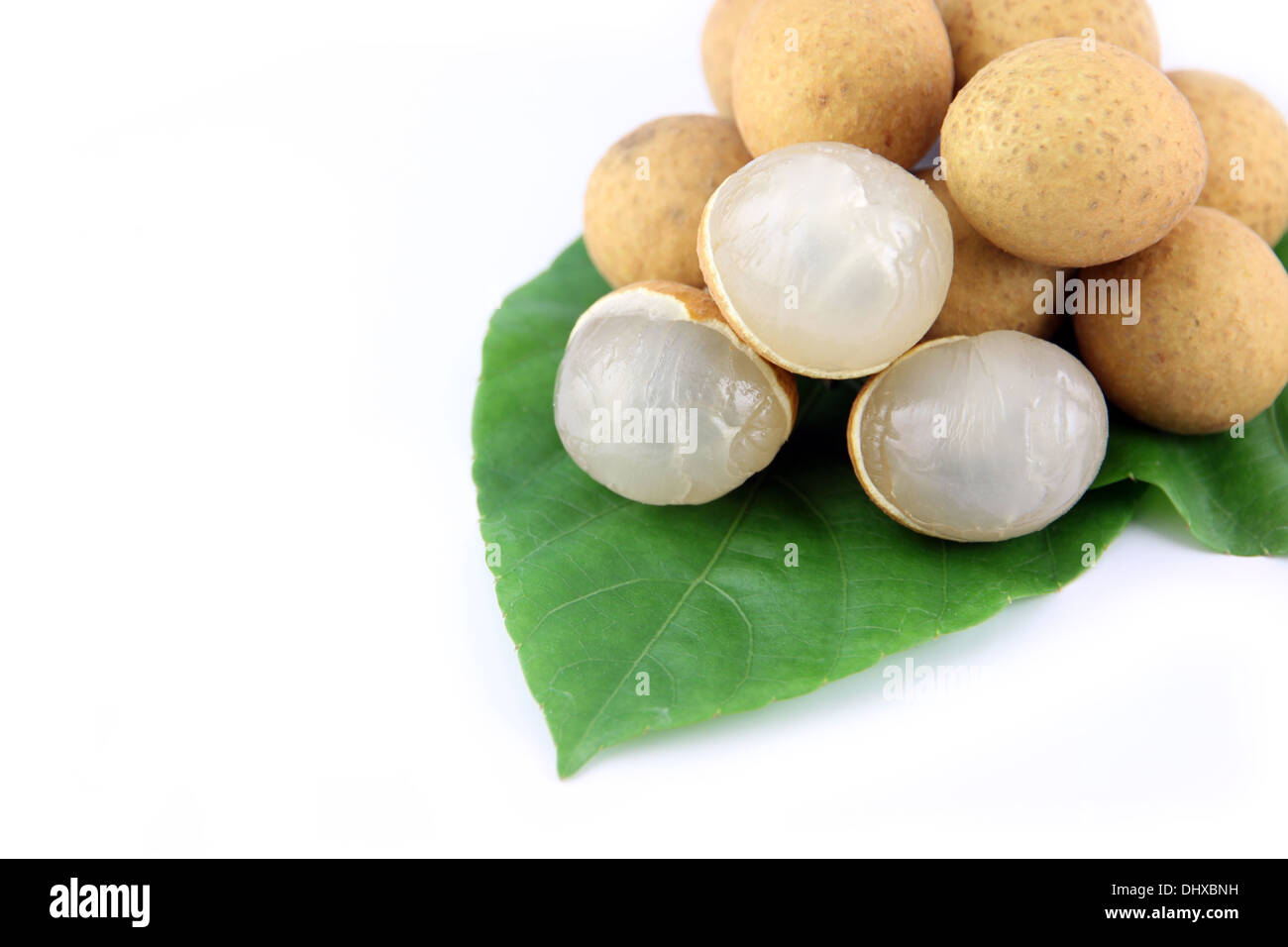 Close up longan in the black dish Stock Photo - Alamy