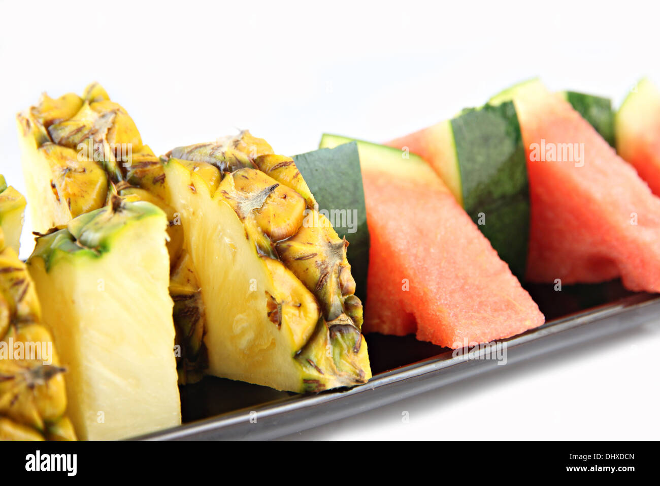 Picture closeup Pineapple and Watermelon slice Arranged in the black ...
