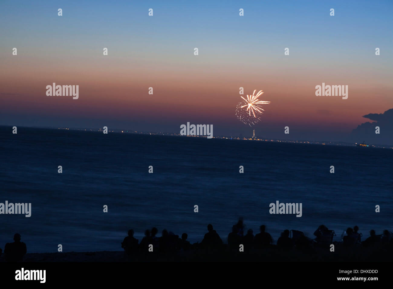 Fireworks Over Water at Dusk Stock Photo - Alamy