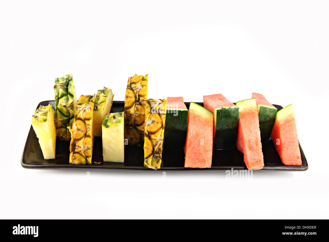 Picture closeup Pineapple and Watermelon slice Arranged in the black ...