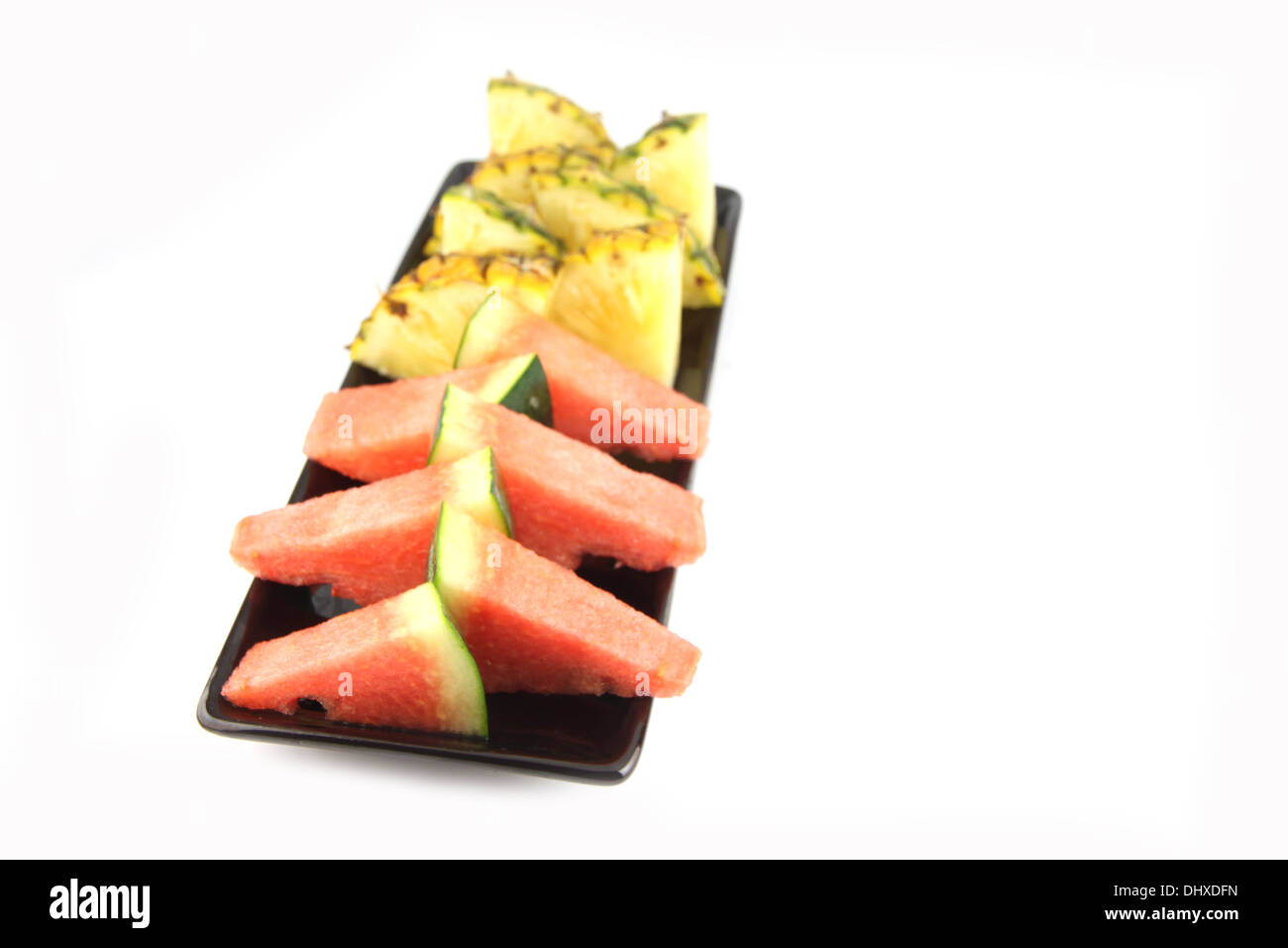 Picture closeup Pineapple and Watermelon slice Arranged in the black ...