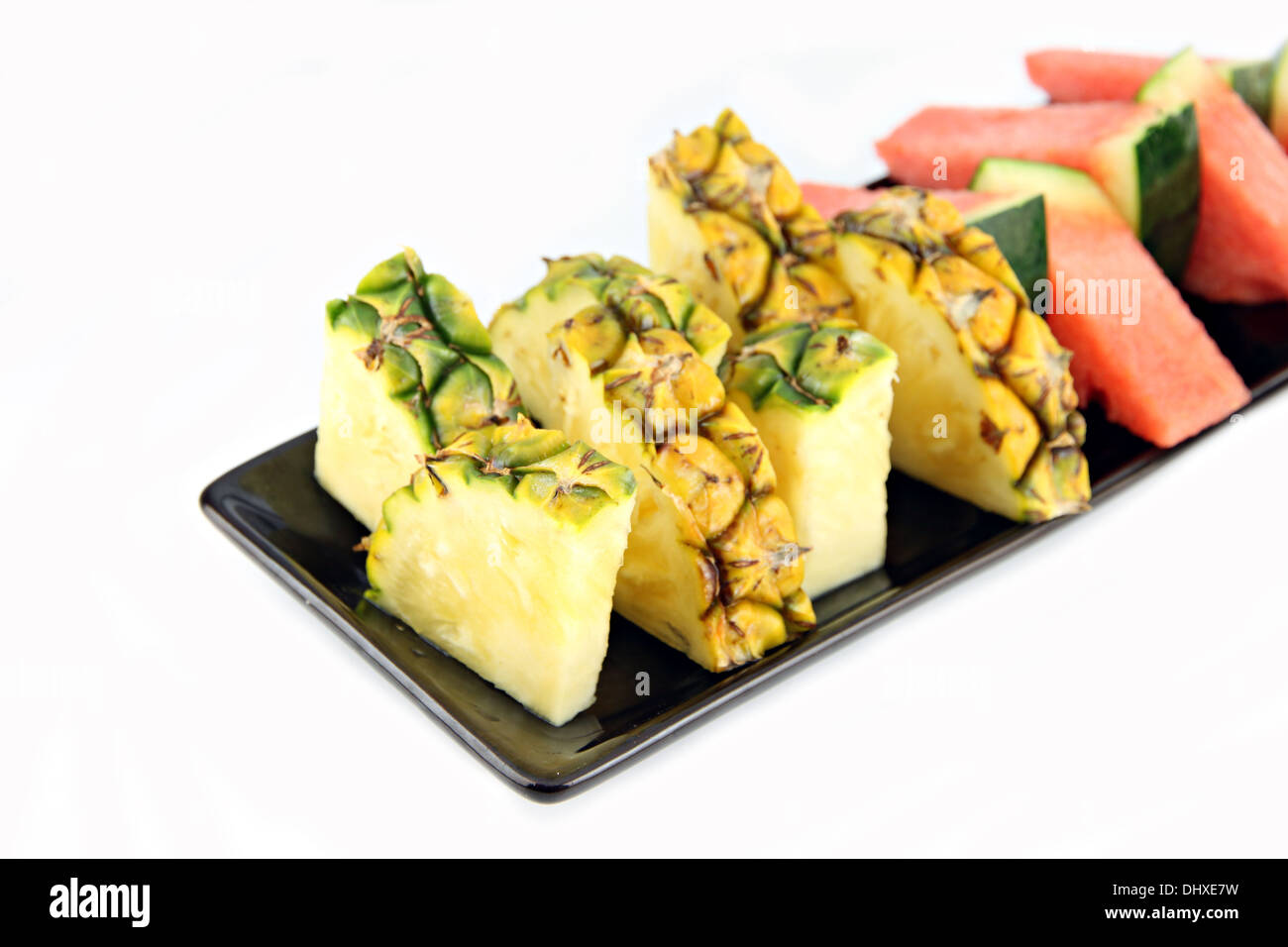 Picture closeup Pineapple and Watermelon slice Arranged in the black ...