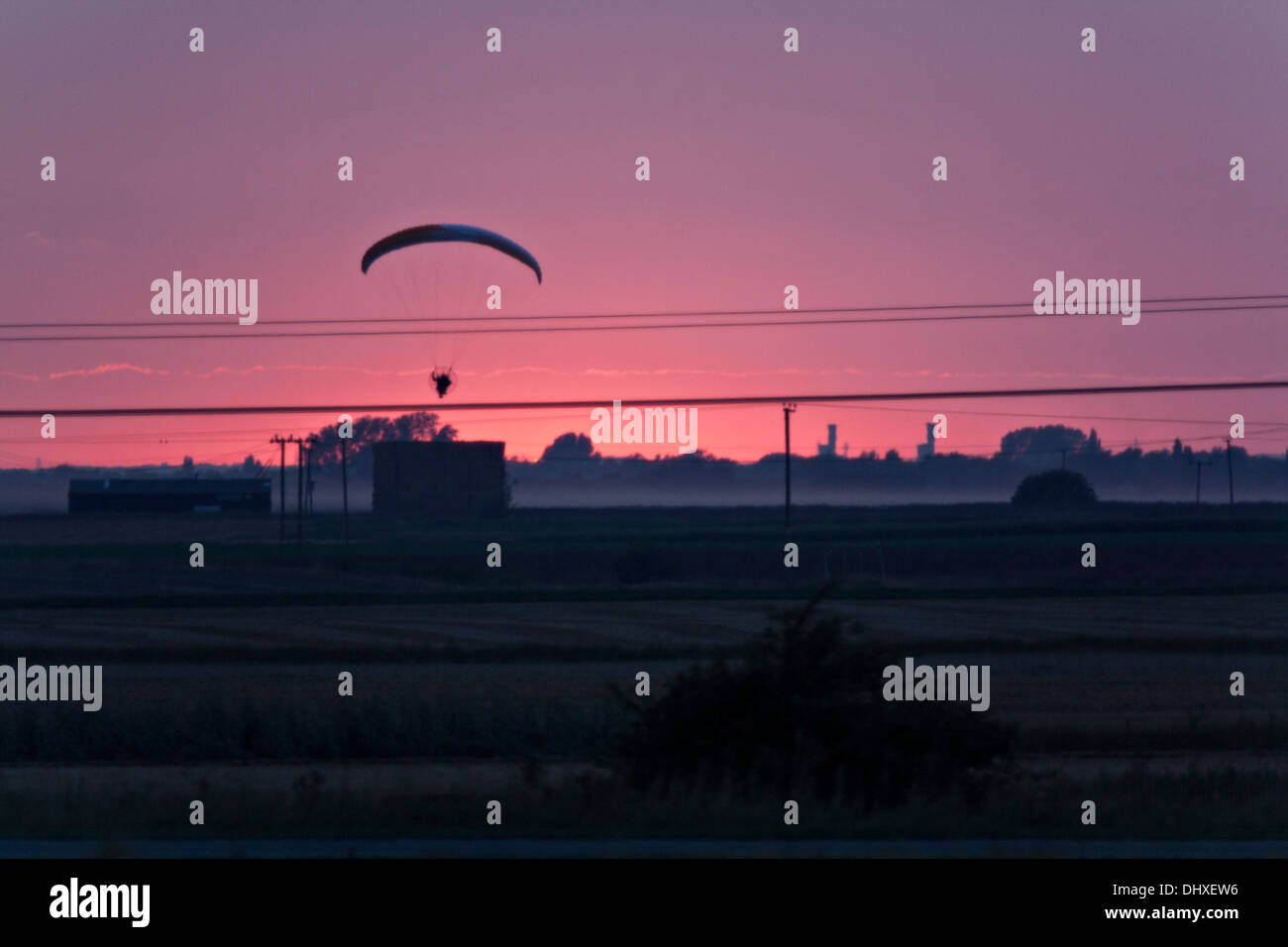 Sunset with paraglider hi-res stock photography and images - Alamy