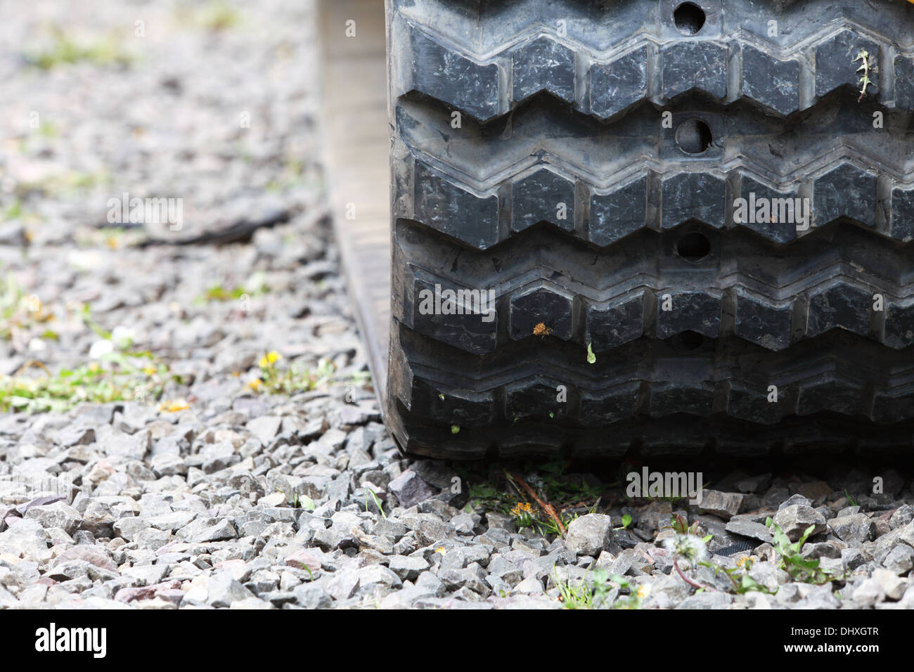 Tracks of small digger excavator heavy equipment industrial detail ...
