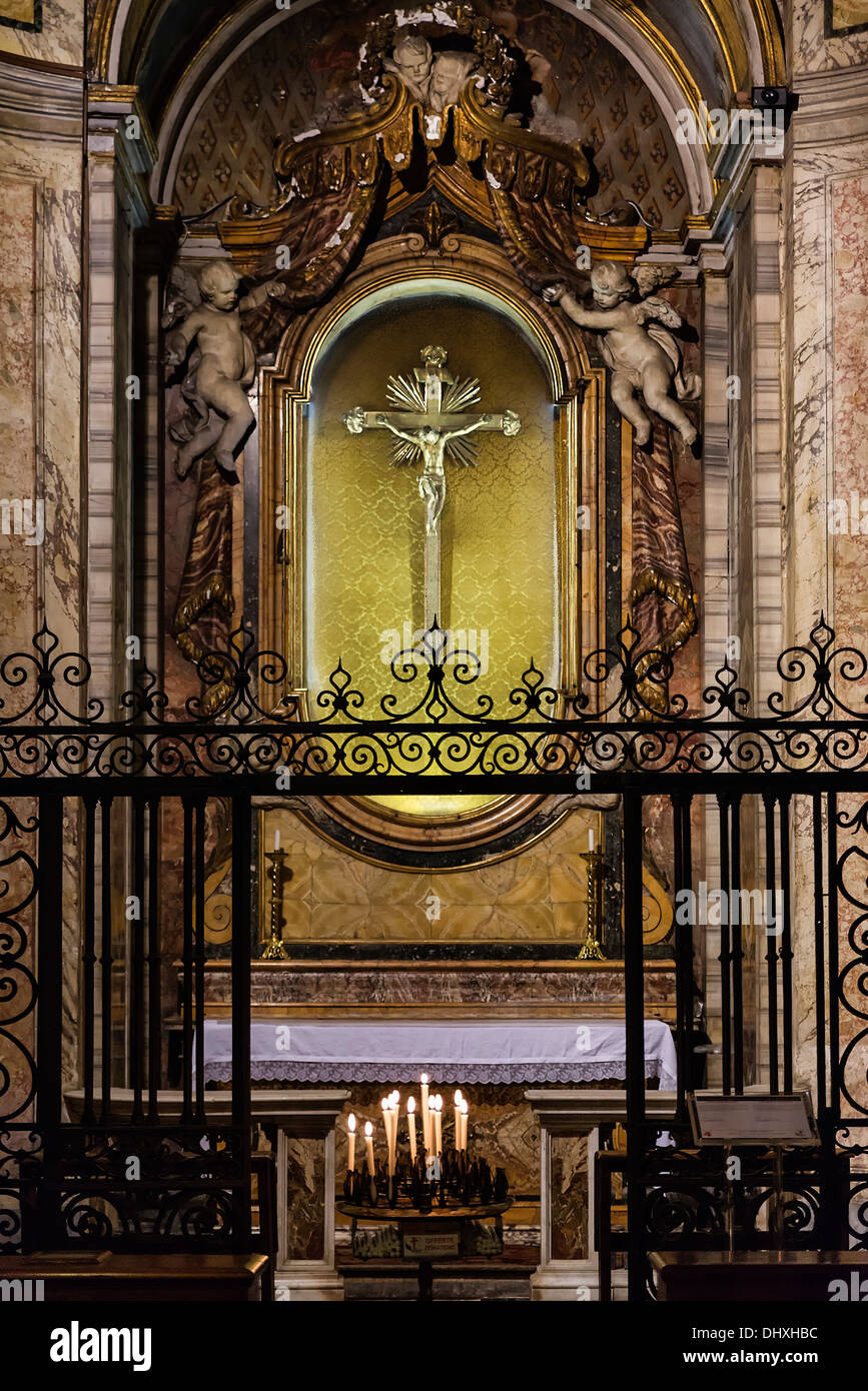 Alter shrine and tomb of Saint Camillus de Lellis with prayer candles ...