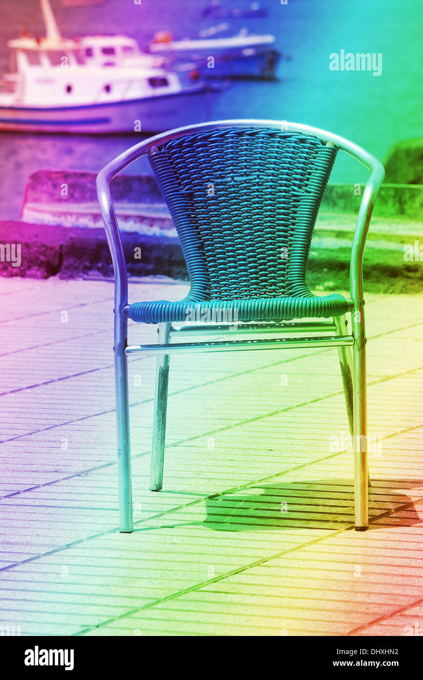 rainbow-colored basket chair Stock Photo - Alamy