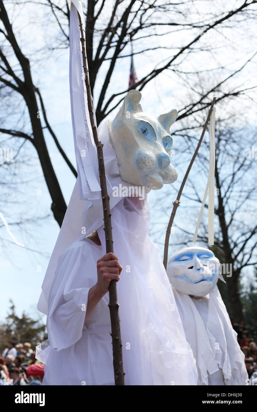 People in animal costumes at the May Day parade and festival in ...