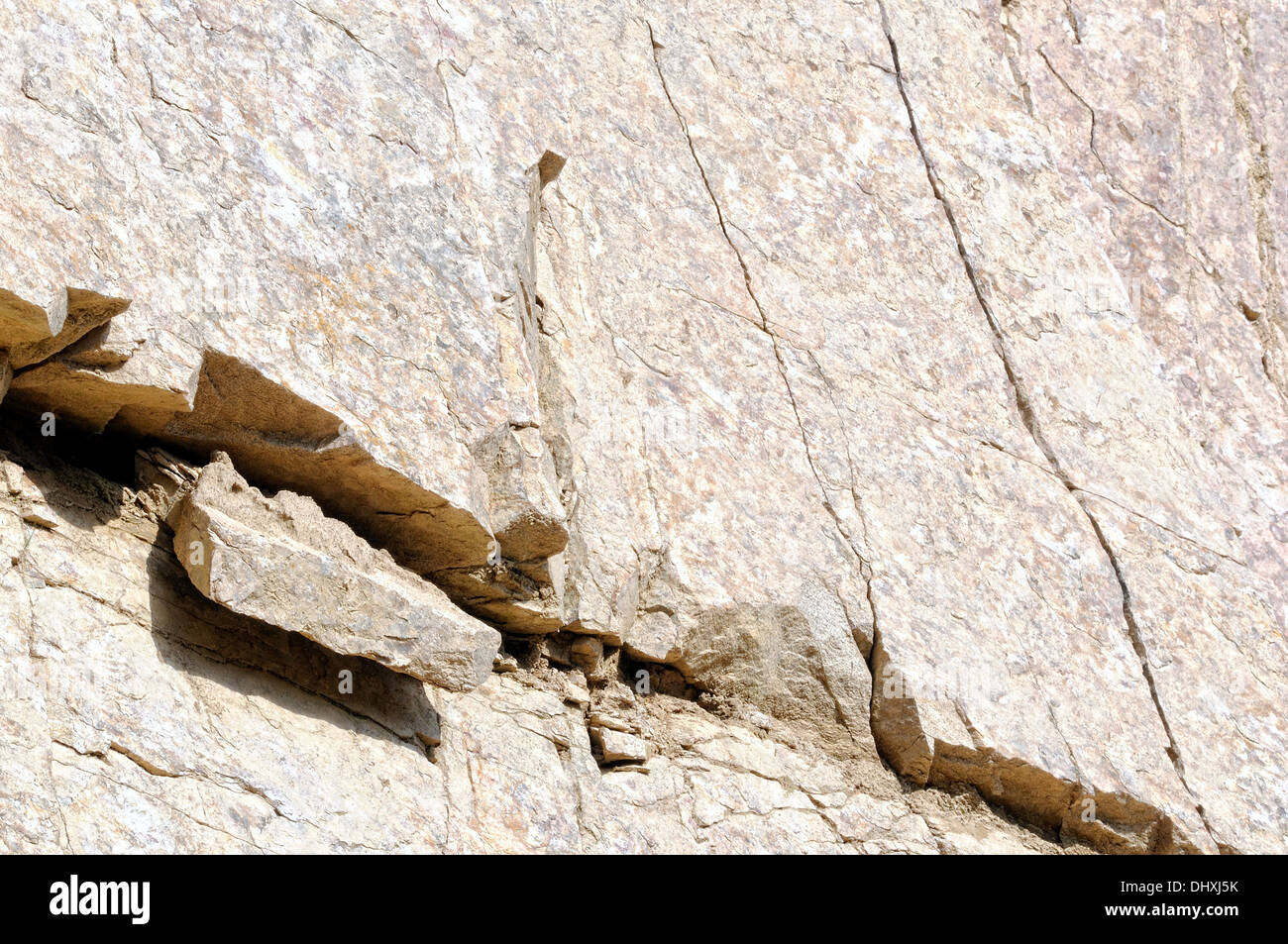 dangerous in the wall in the quarry Stock Photo - Alamy