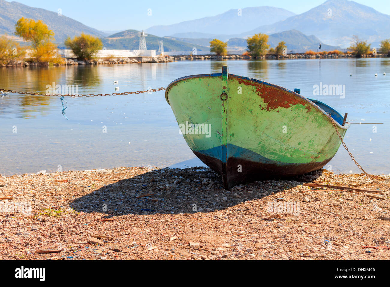 Green boat on sand beach hi-res stock photography and images - Alamy