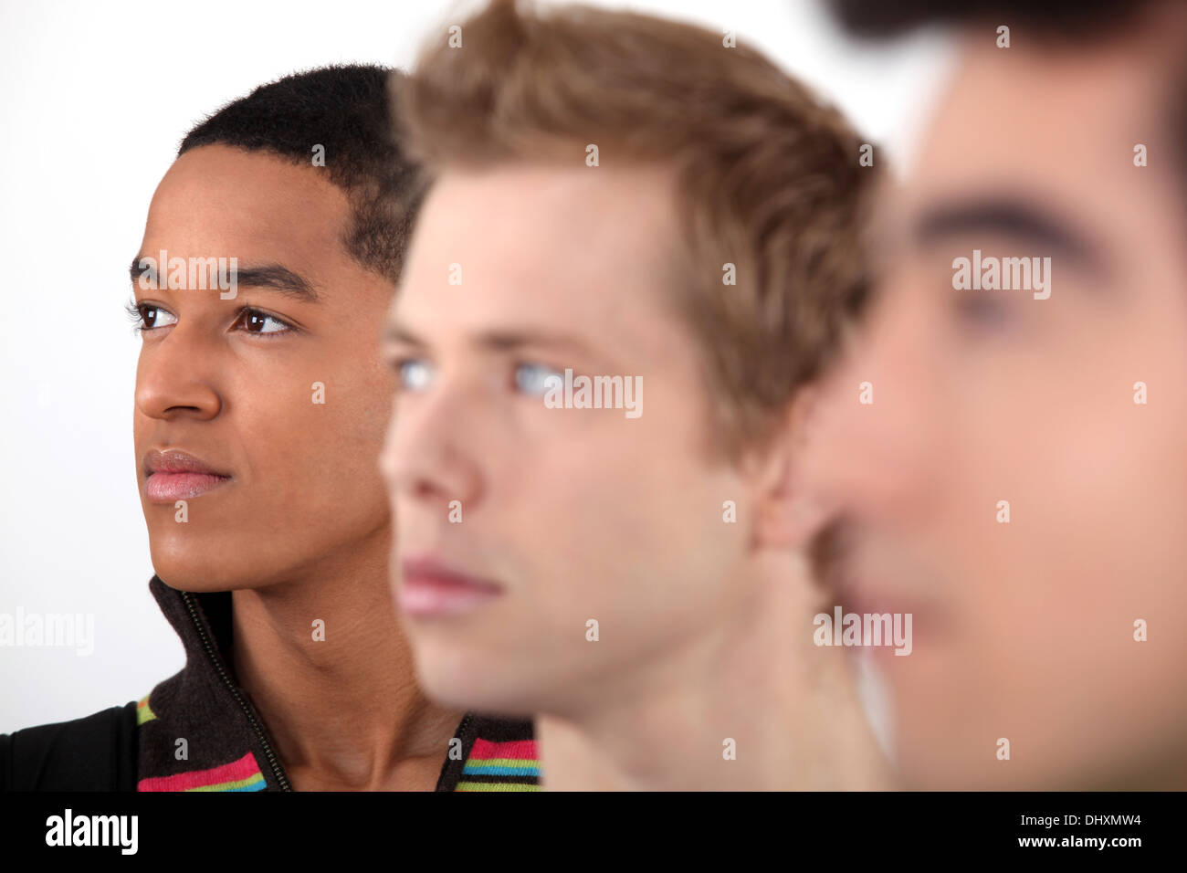 Portrait of three male students Stock Photo - Alamy