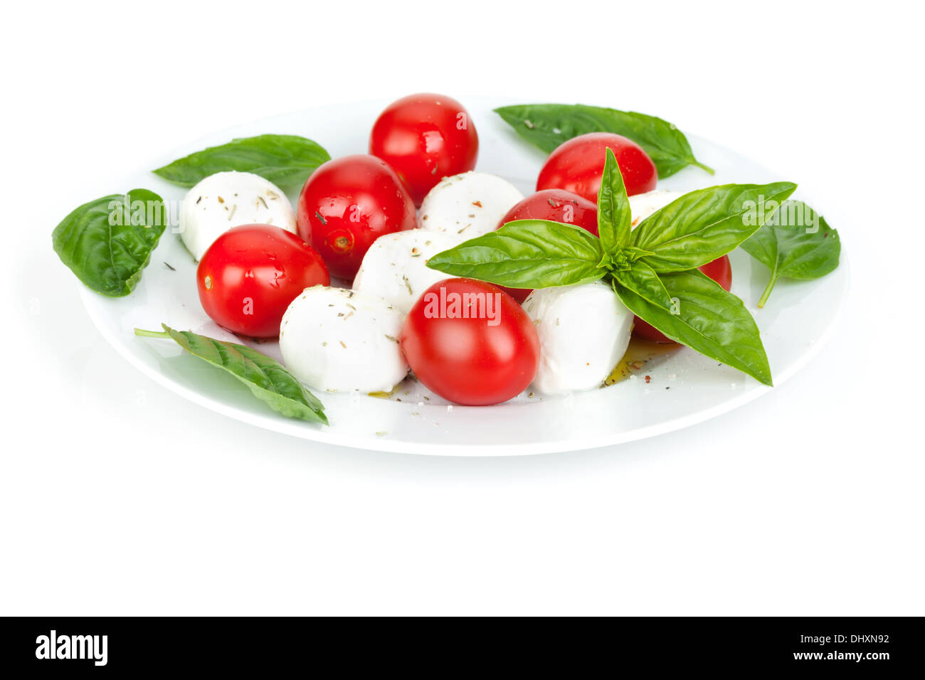 Caprese salad. Isolated on white background Stock Photo - Alamy