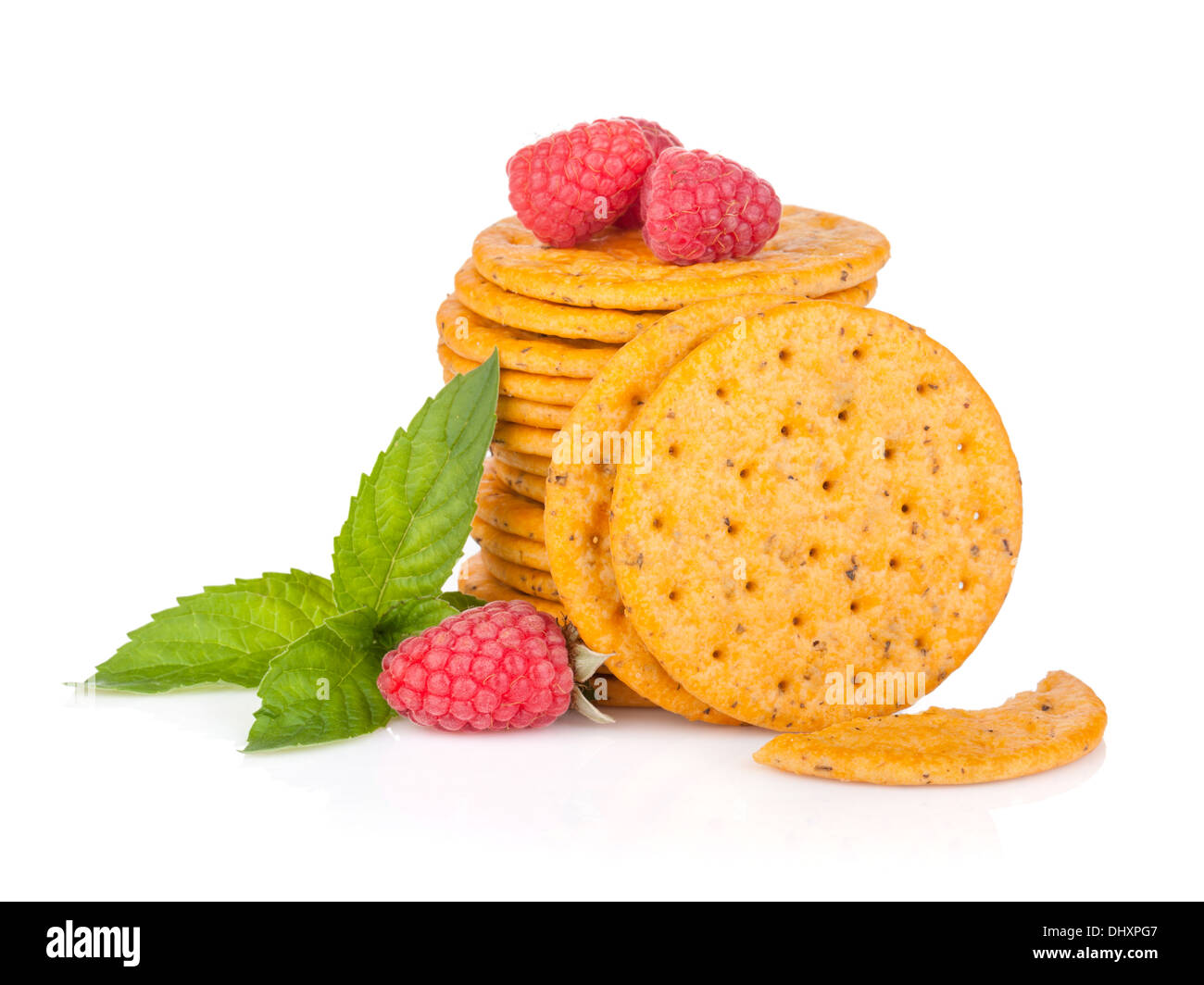 Stack of crackers with mint and berries. Isolated on white background ...