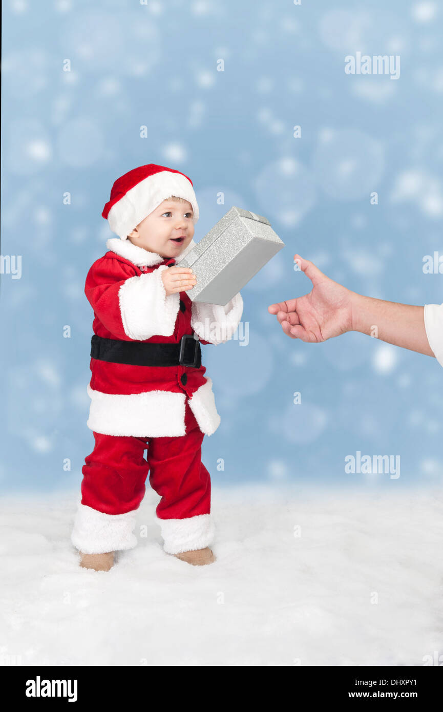 little father christmas with goft Stock Photo - Alamy